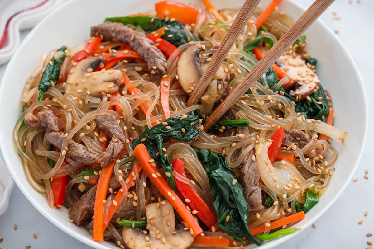 Simple Japchae Recipe - Cooking Enthusiast - feastfulcuisine.com